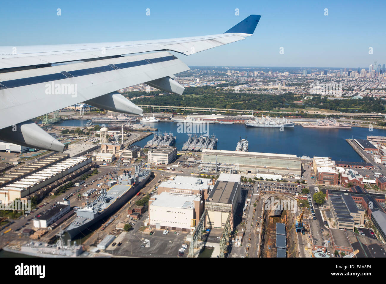 Flying over the Naval Base in Philadelphia, with warships from the ...