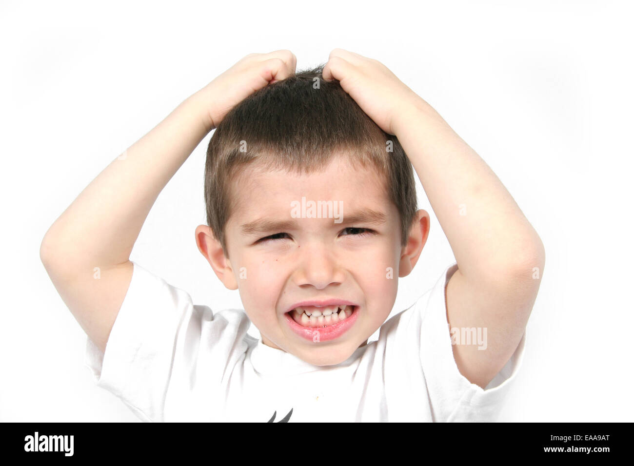Angry Boy with hands on head - mad Stock Photo - Alamy