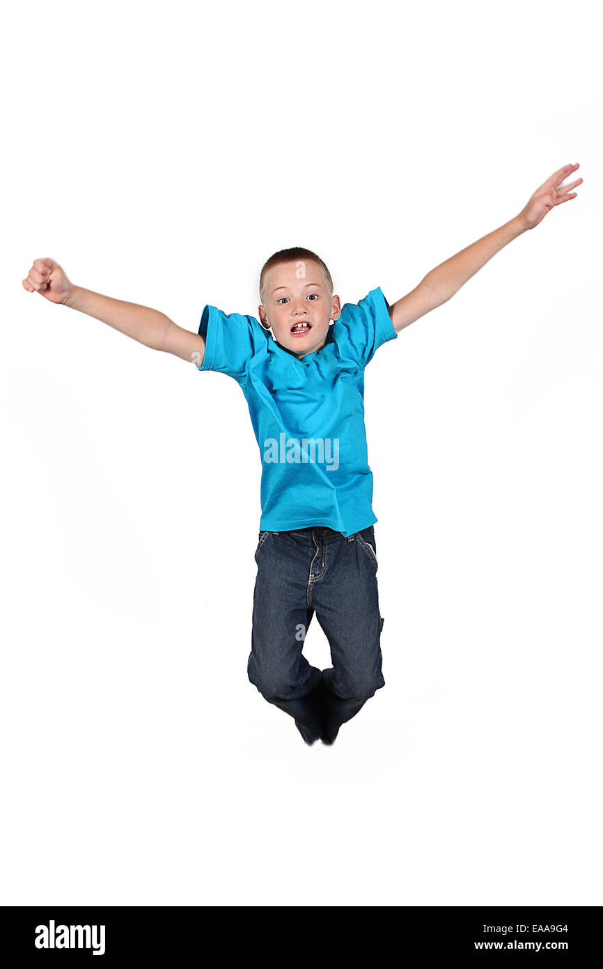 Young Boy Jumping in the air with isolated white background Stock Photo ...
