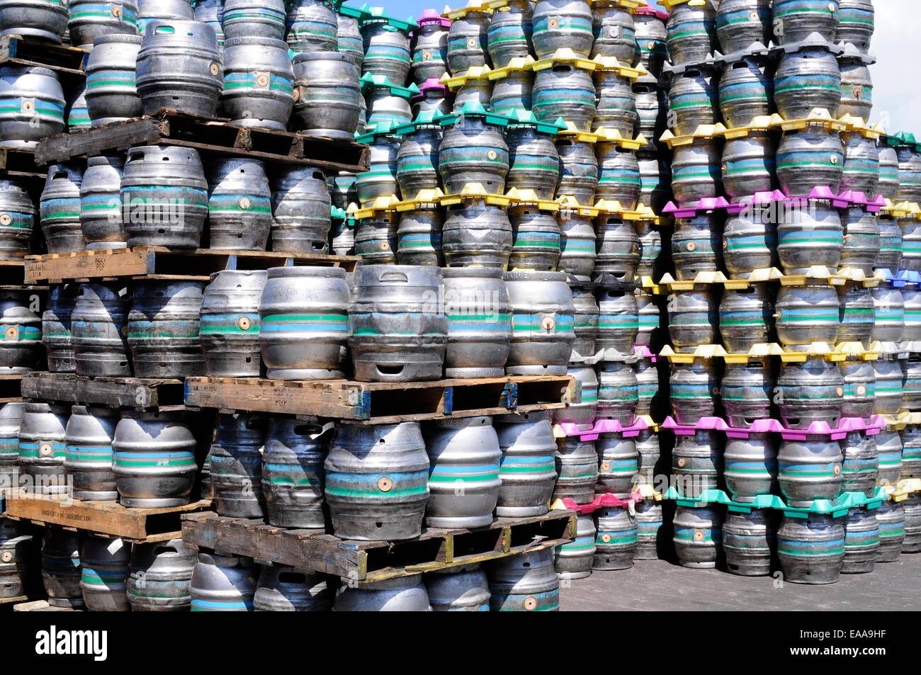 Beer barrels stacked high at a brewery Stock Photo - Alamy