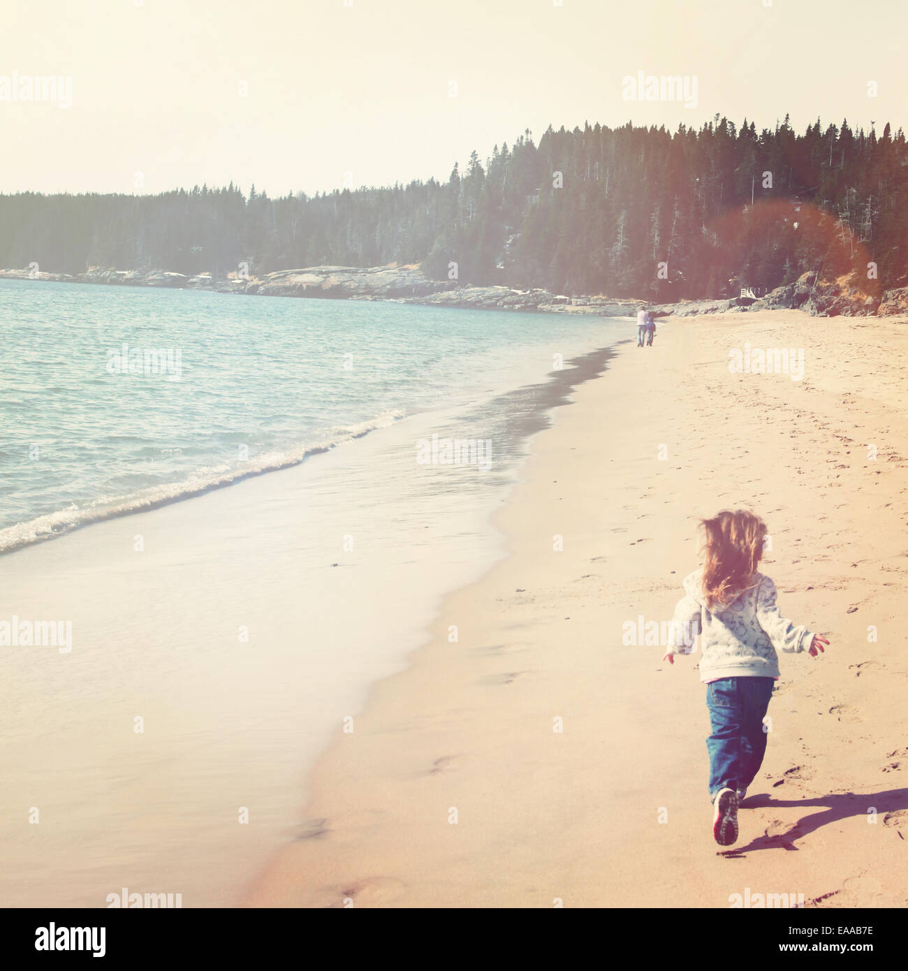 kids walking on a path by beach Stock Photo - Alamy