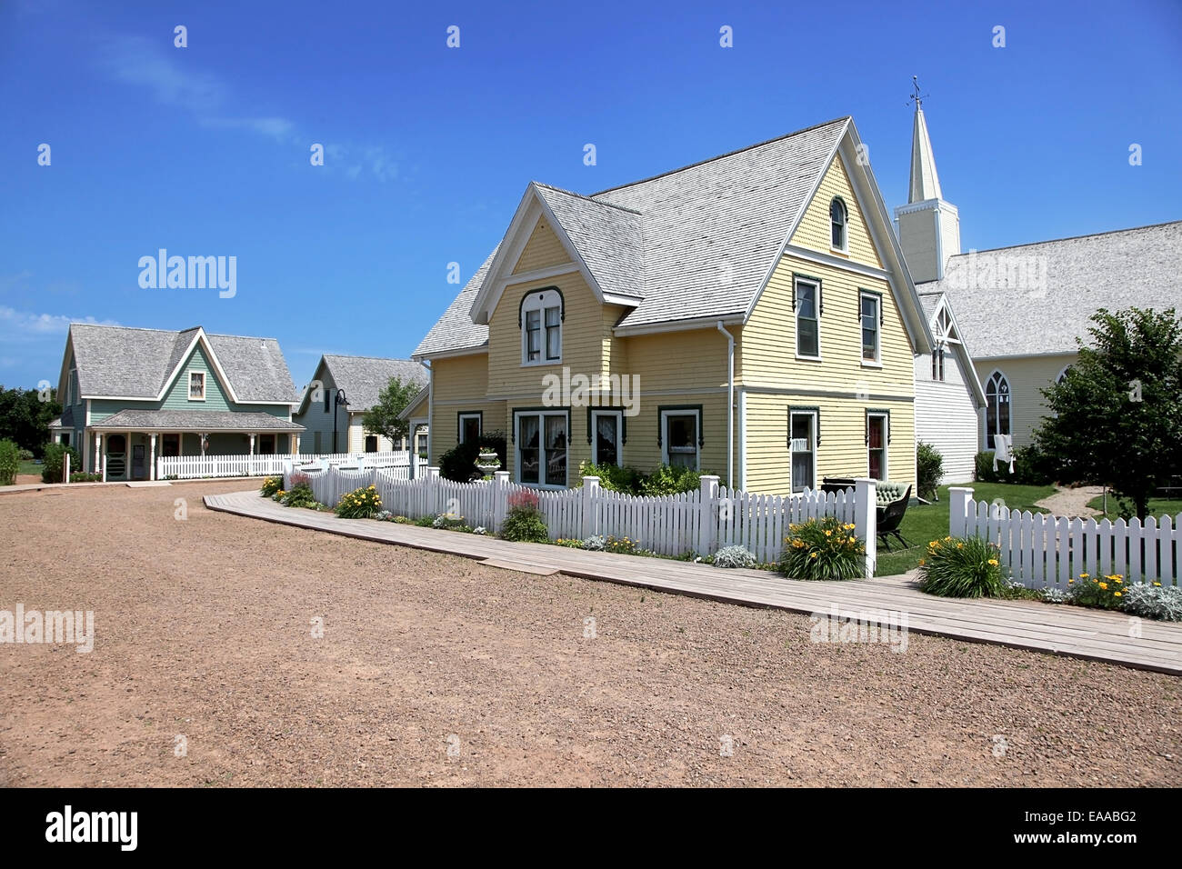 Beautiful old yellow house in summer Stock Photo - Alamy