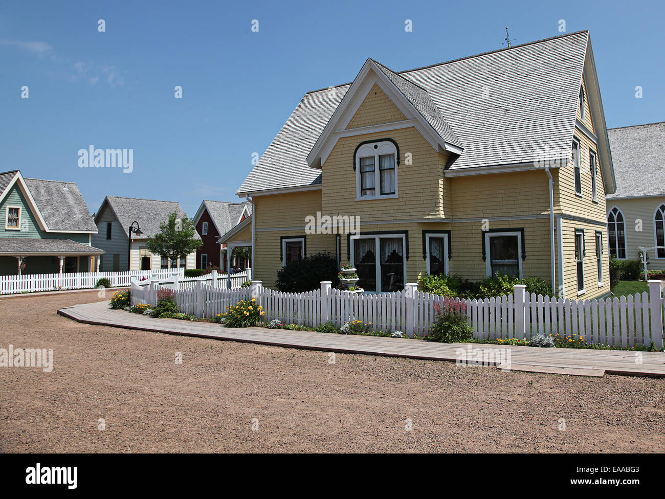 Beautiful old yellow house in summer Stock Photo - Alamy
