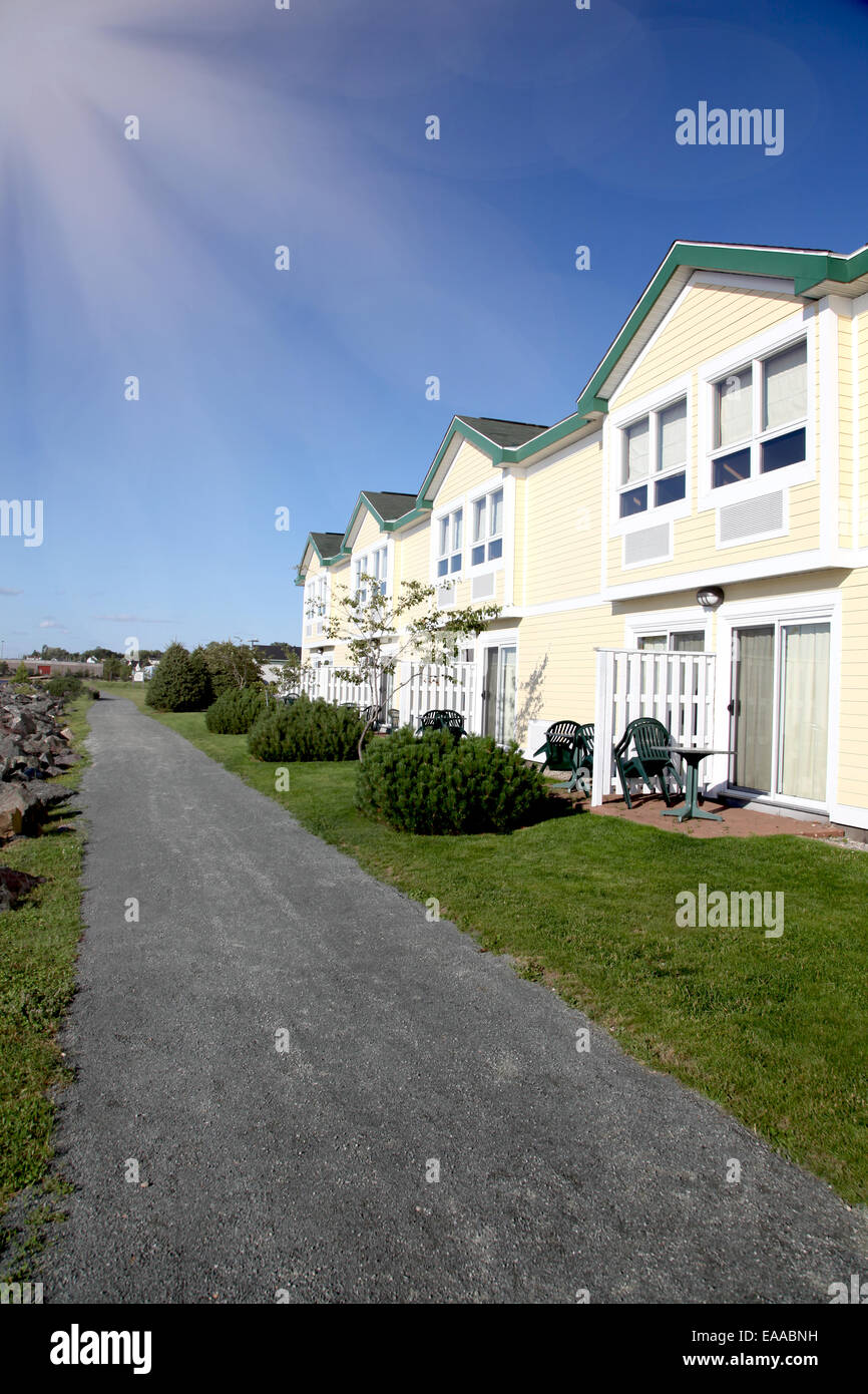 Beautiful new housing complex with landscaped walkway Stock Photo - Alamy