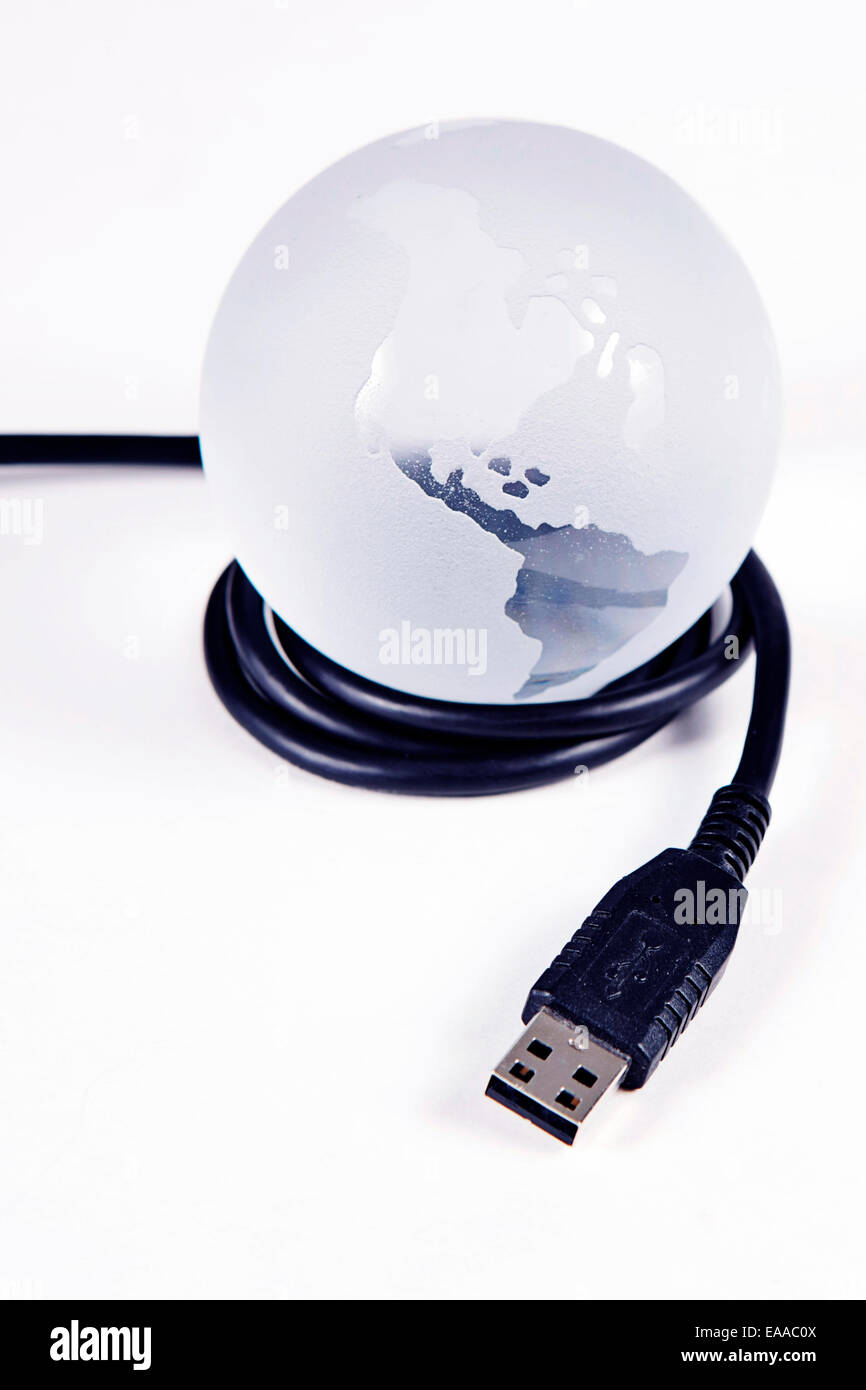 crystal globe on top of usb cable Stock Photo - Alamy