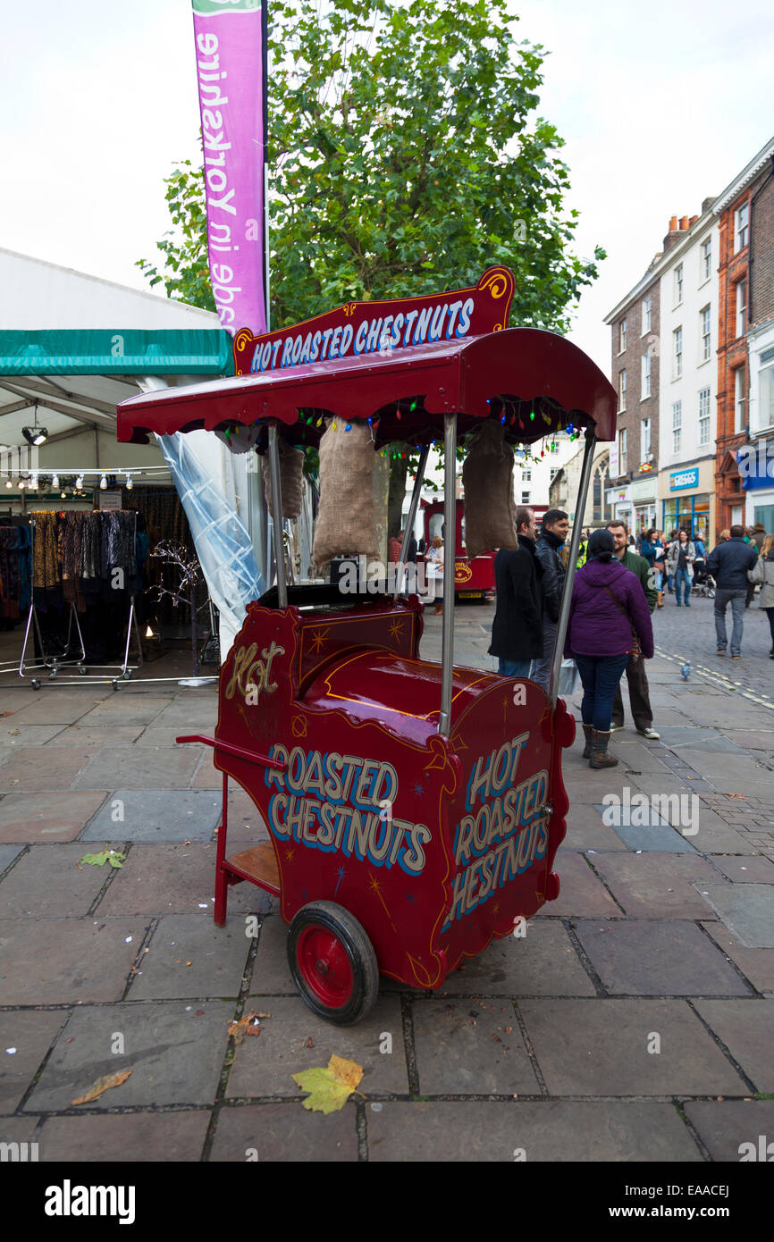 roasted chestnuts cart seller York City Centre UK England selling junk ...