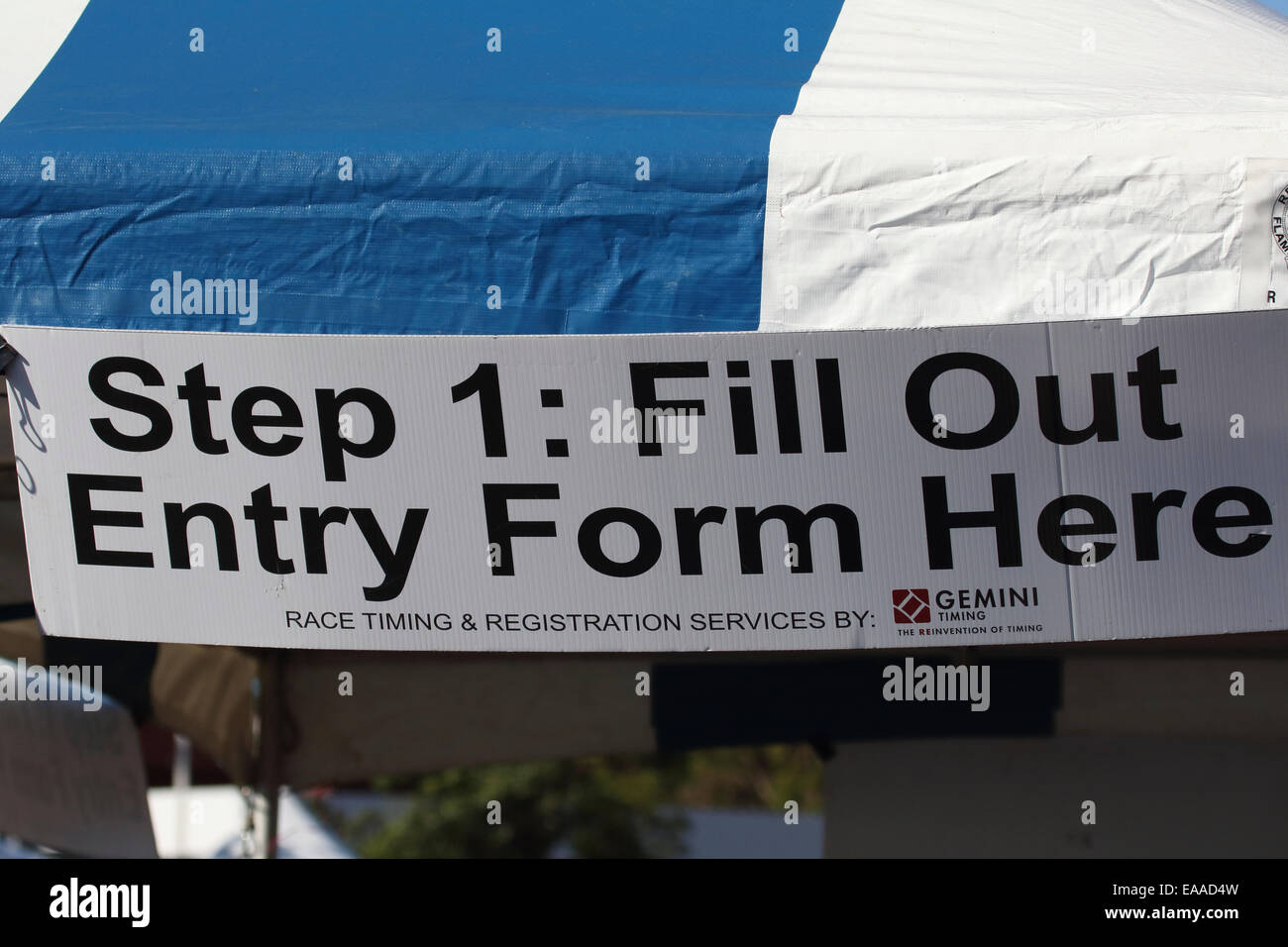 Step 1 fill out entry form here sign Stock Photo - Alamy
