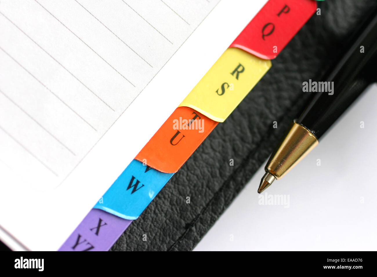 Address book with alphabet and pen closeup Stock Photo - Alamy