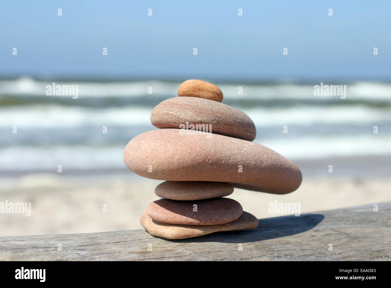 Pile of pebble stones balancing on each other Stock Photo - Alamy
