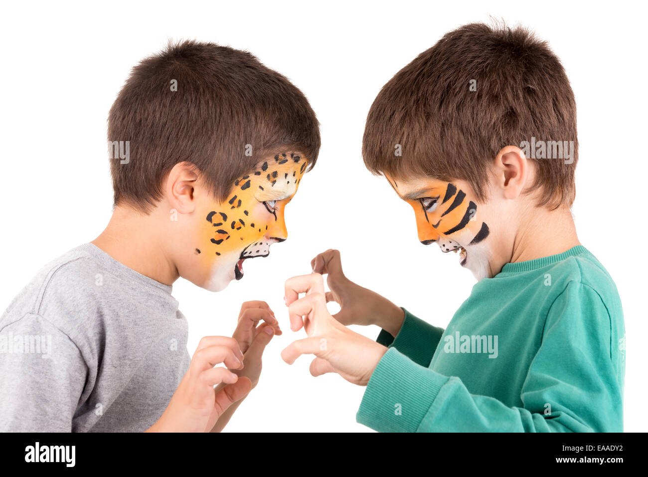 Boys with face-painted like a leopard and tiger isolated in white Stock ...