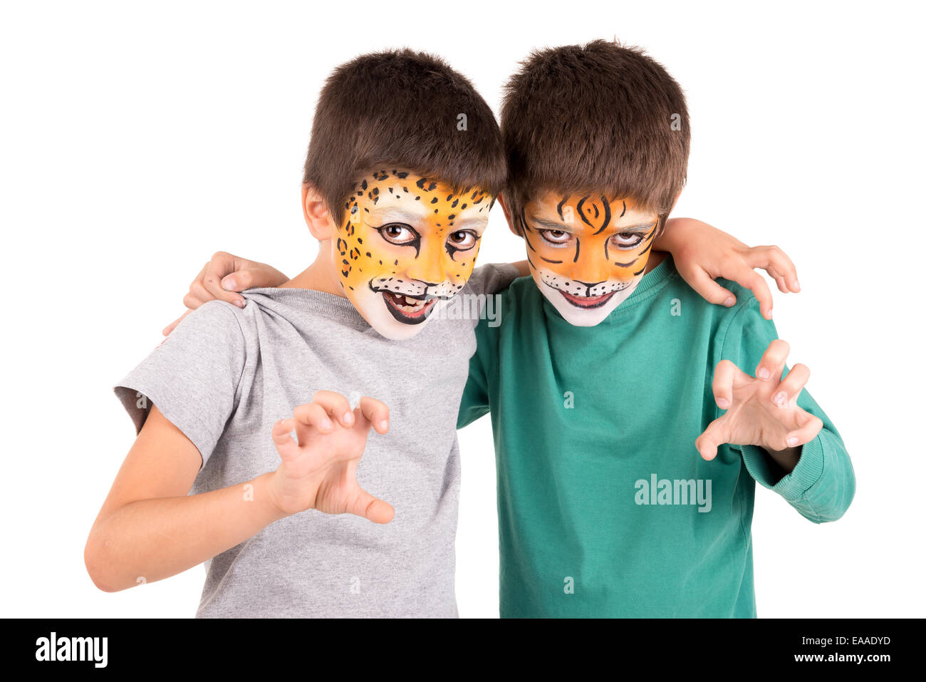 Boys with face-painted like a leopard and tiger isolated in white Stock ...
