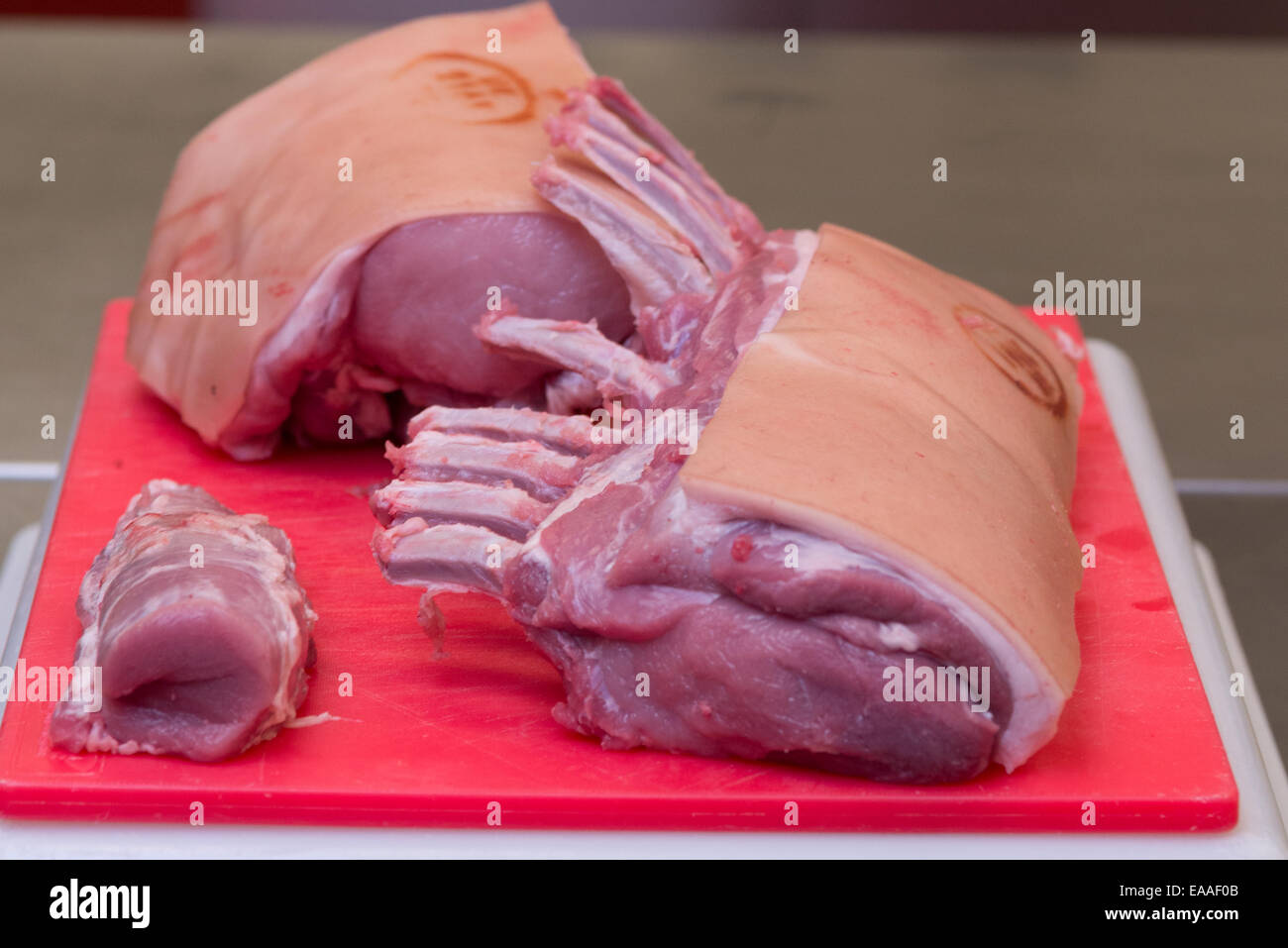 Butcher cutting pork chops meat hi-res stock photography and images - Alamy