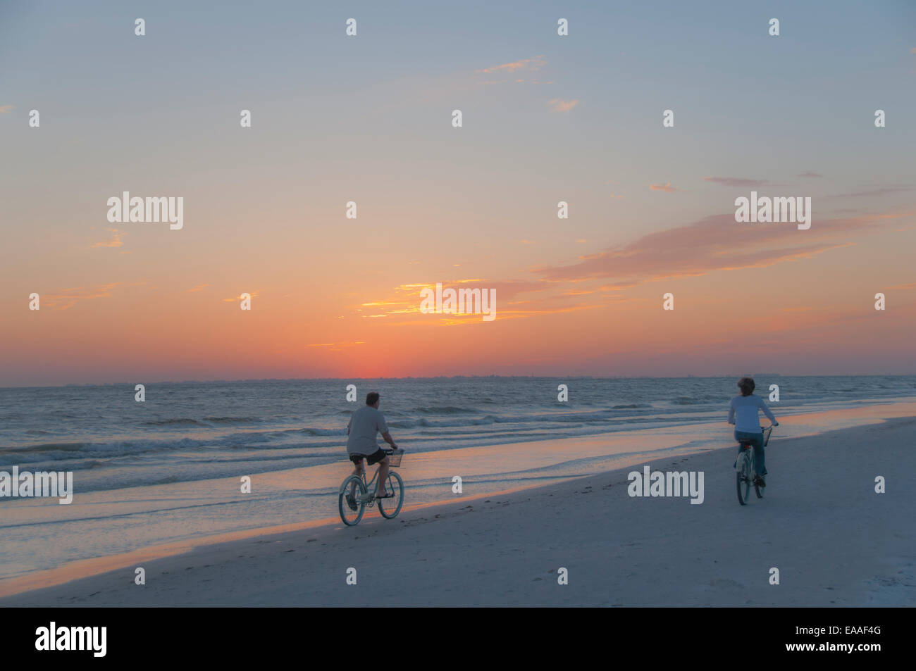 sunset florida beach ocean sea warm summer bicycle Stock Photo - Alamy
