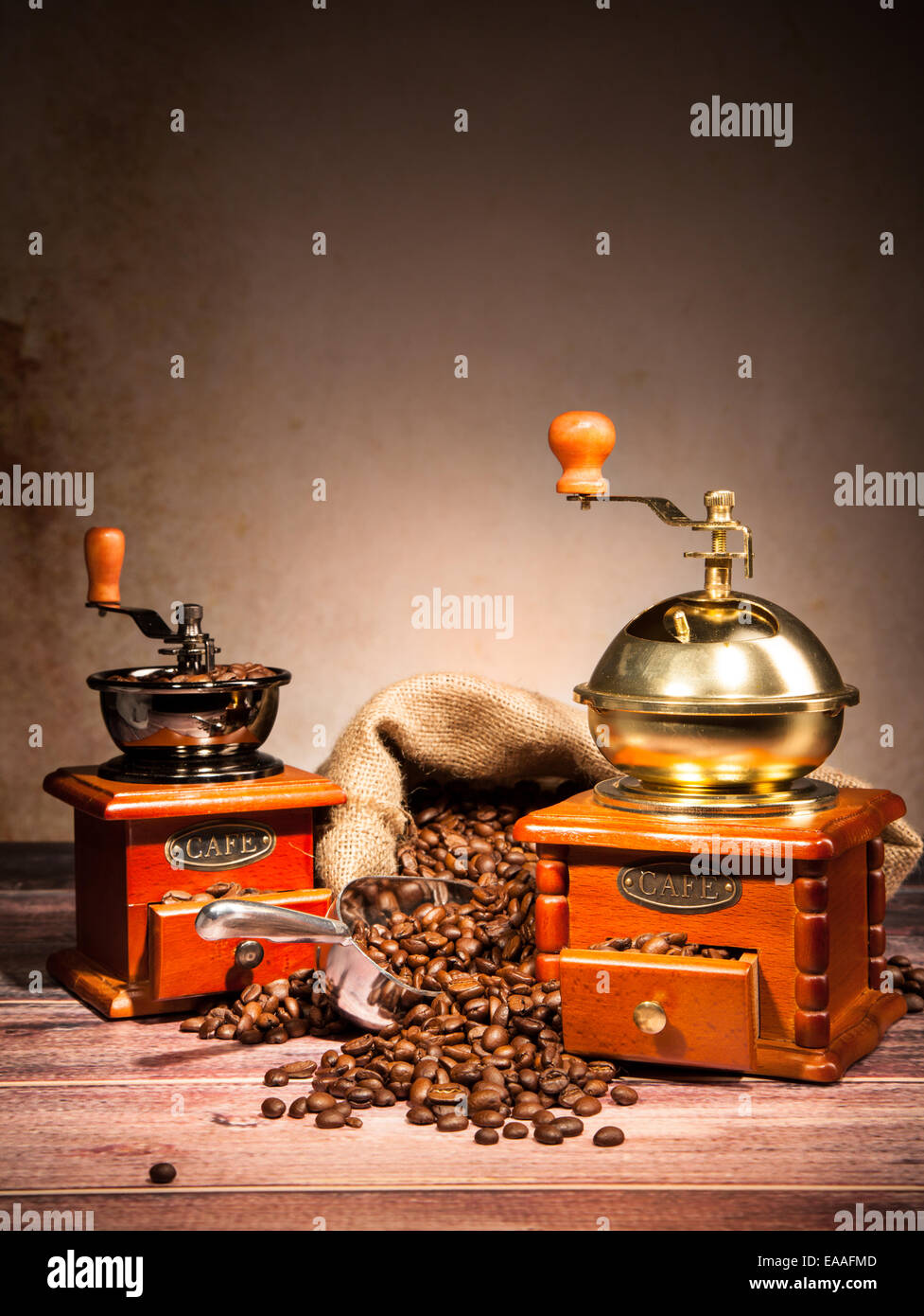 Coffee still life with wooden grinders Stock Photo - Alamy