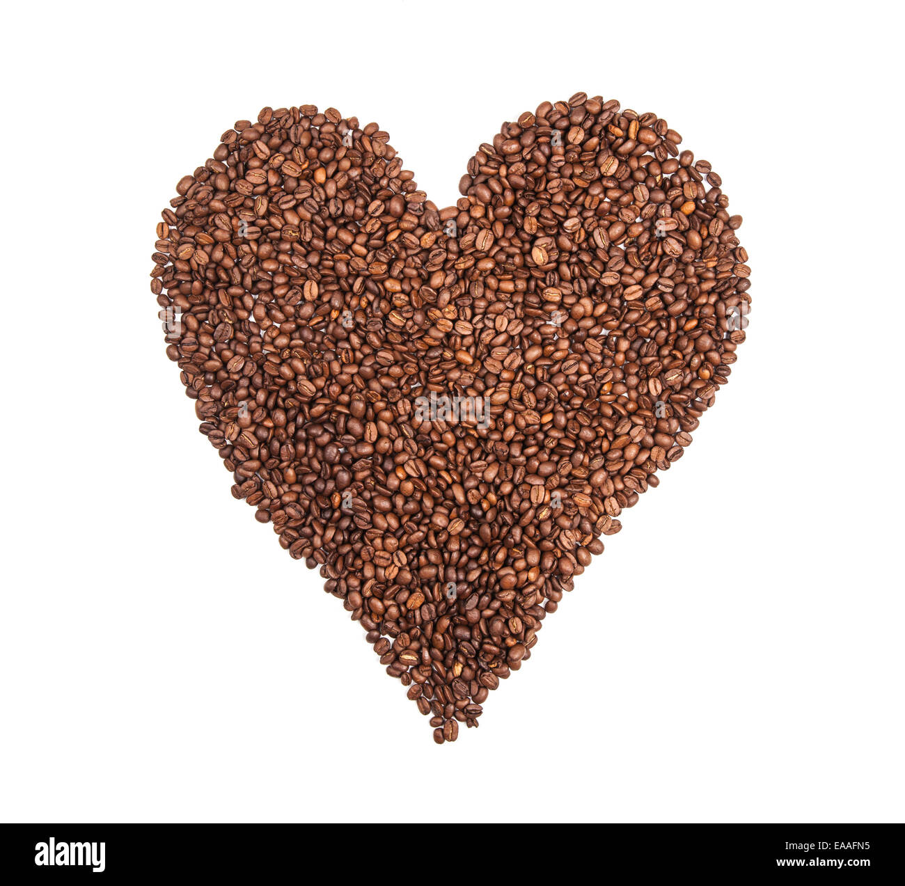 Heart made of coffee beans, isolated on white background Stock Photo ...