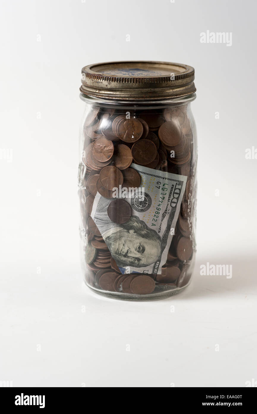 A jar full of pennies Stock Photo - Alamy