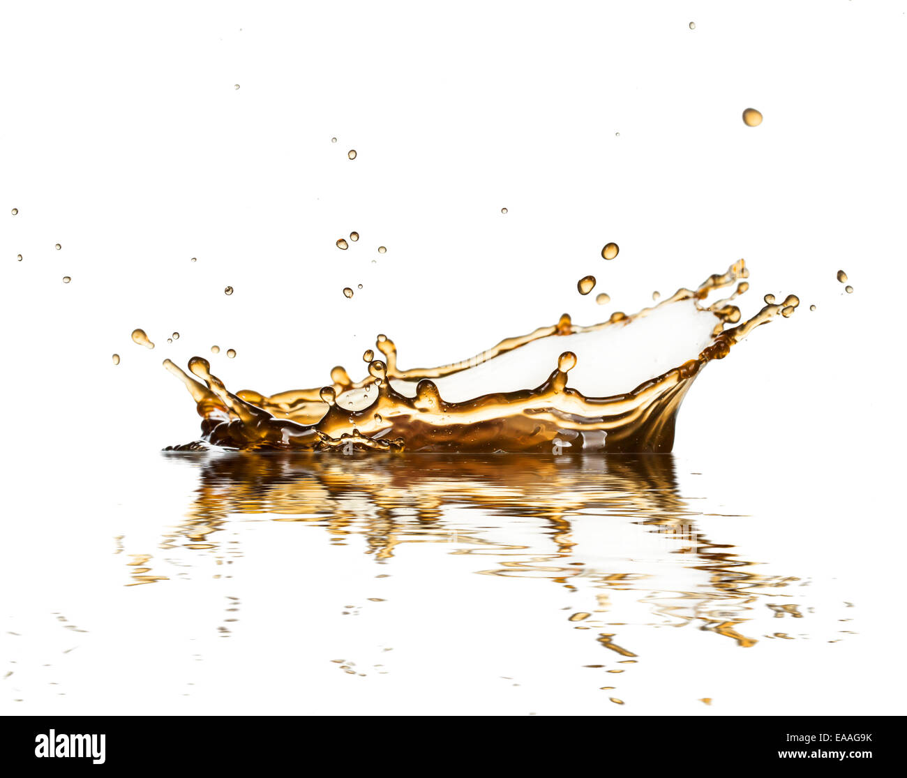 Brown liquid splash of coffee or cola, isolated on white background ...