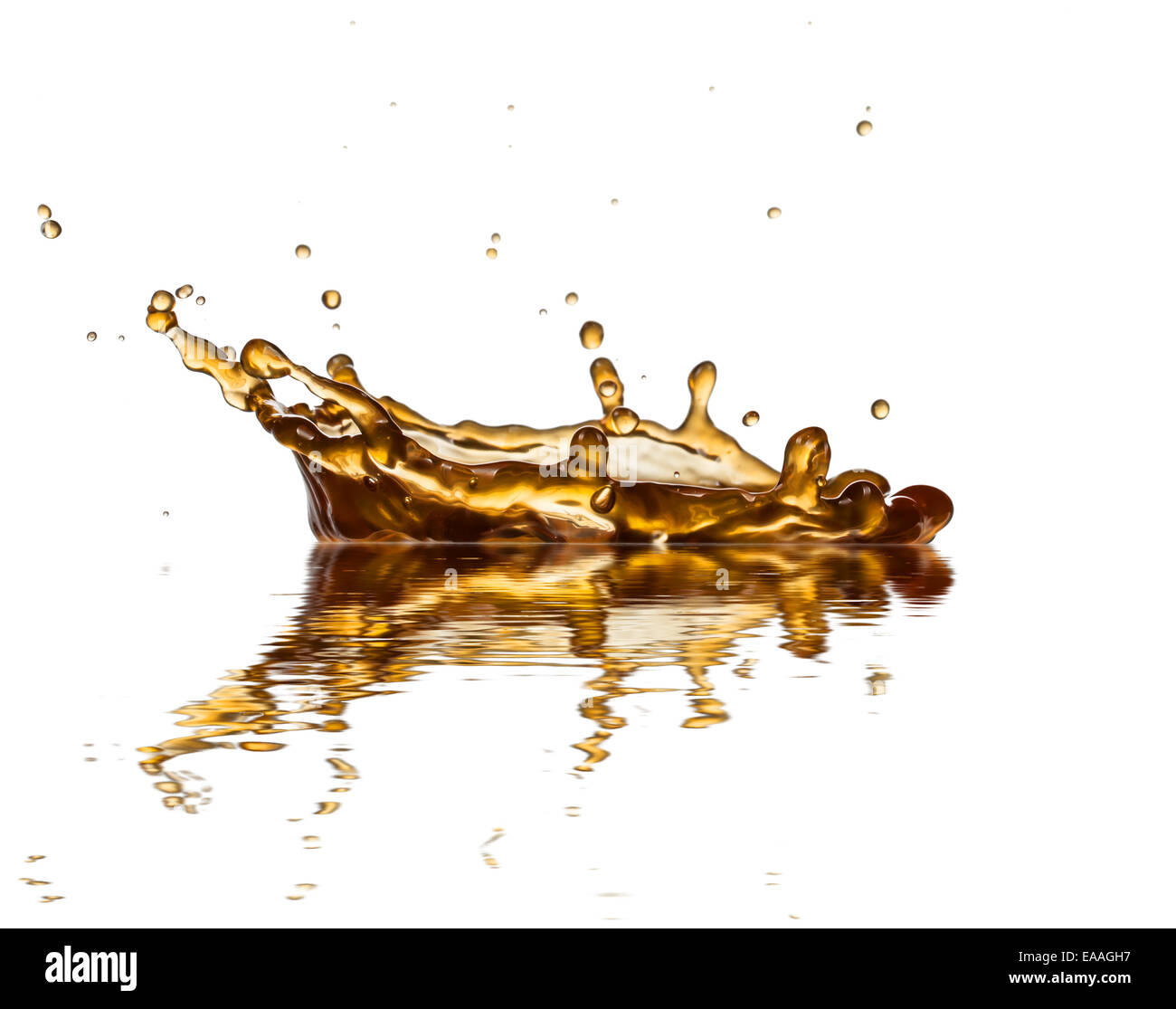 Brown liquid splash of coffee or cola, isolated on white background ...