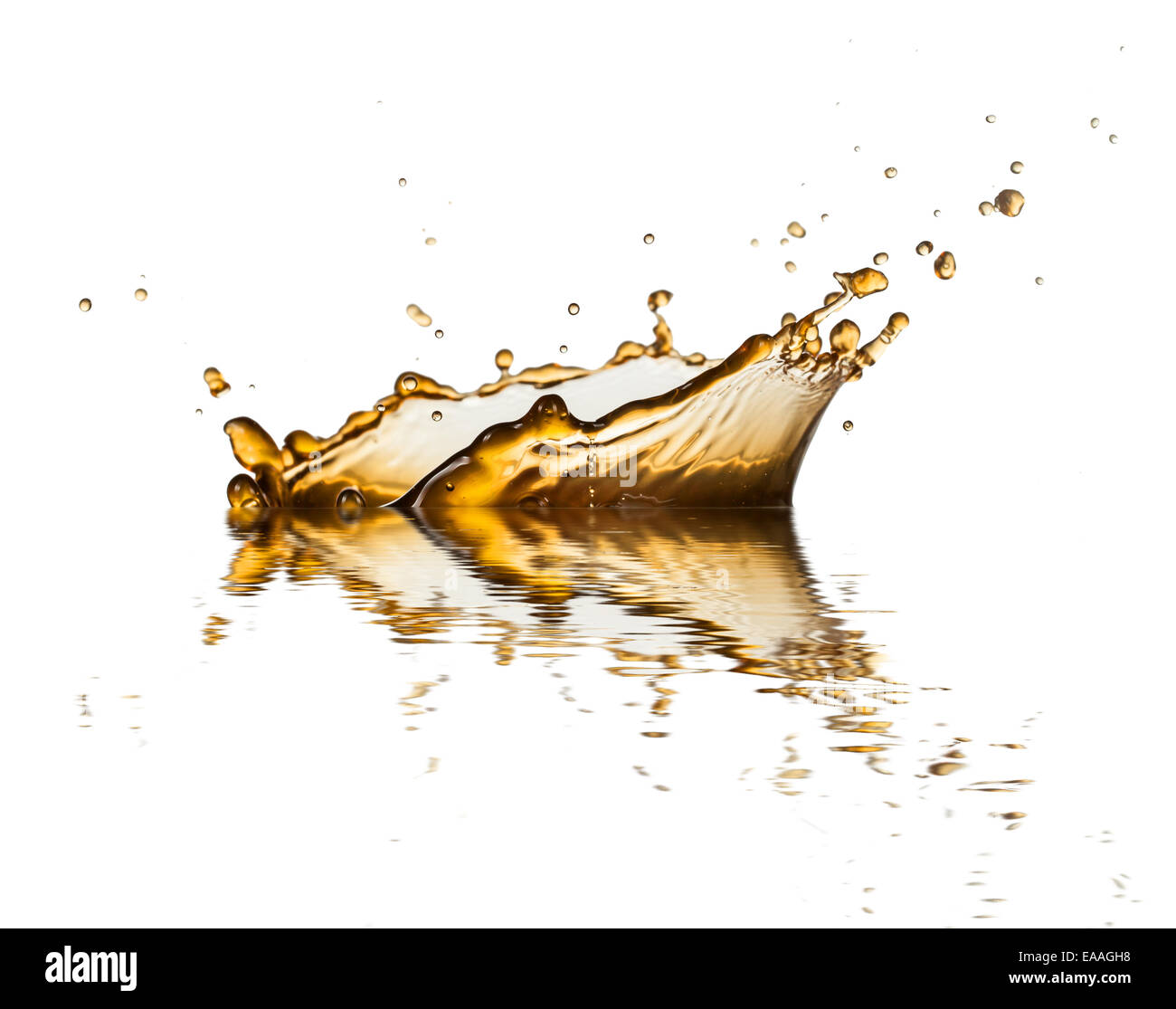 Brown liquid splash of coffee or cola, isolated on white background ...