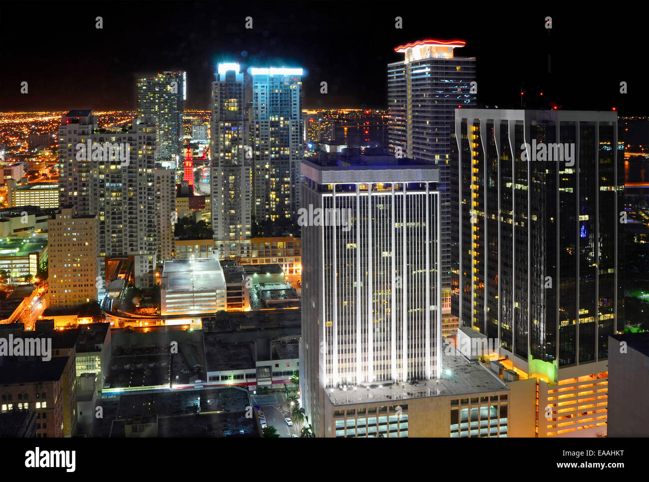 View of the Miami skyline at night with city lights and light trails ...