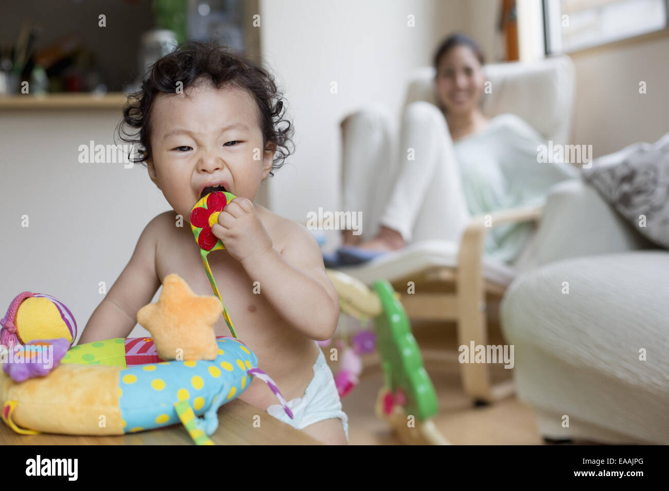 Baby boy playing indoors Stock Photo - Alamy