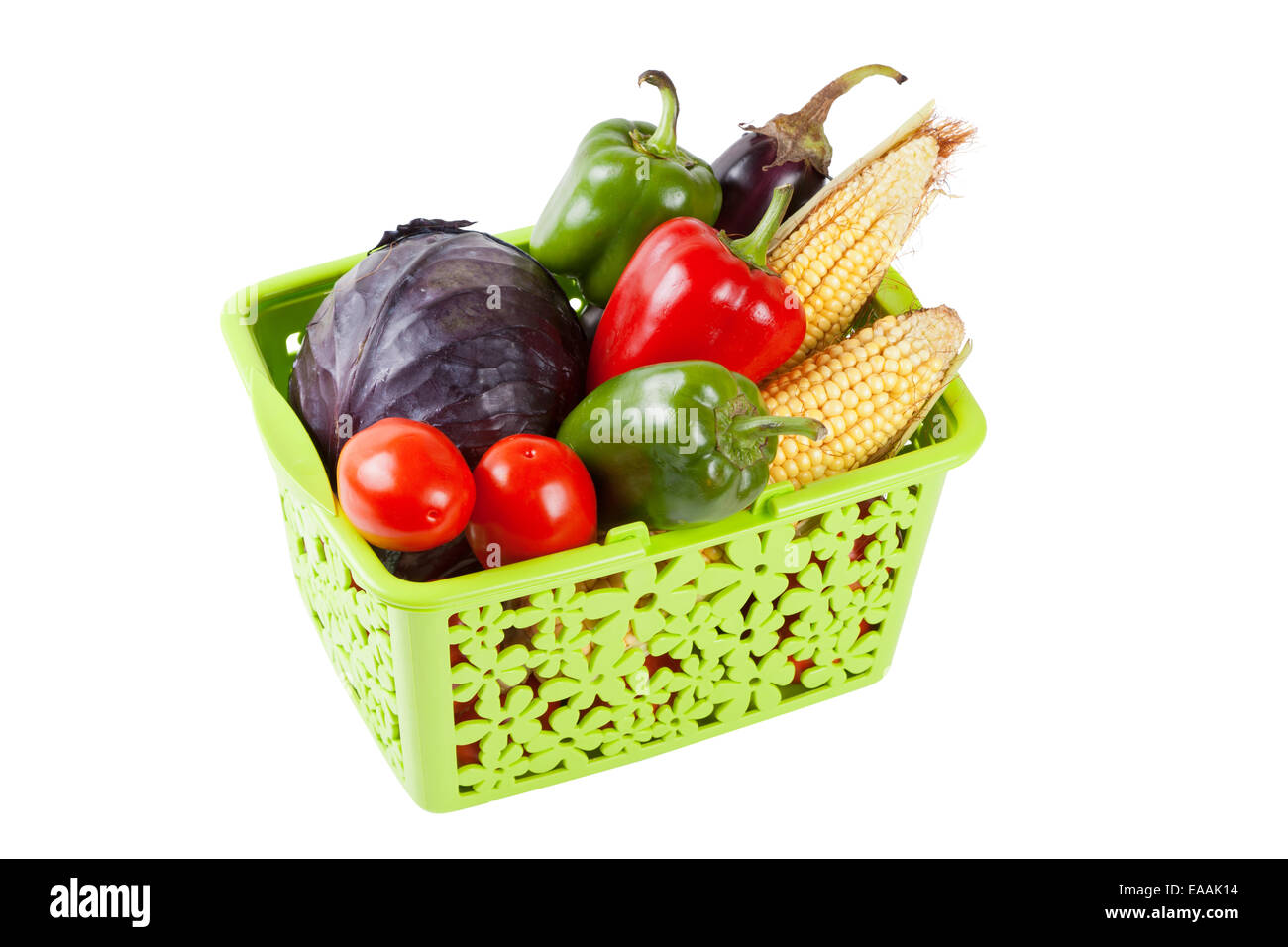 vegetables in green shopping basket Stock Photo - Alamy