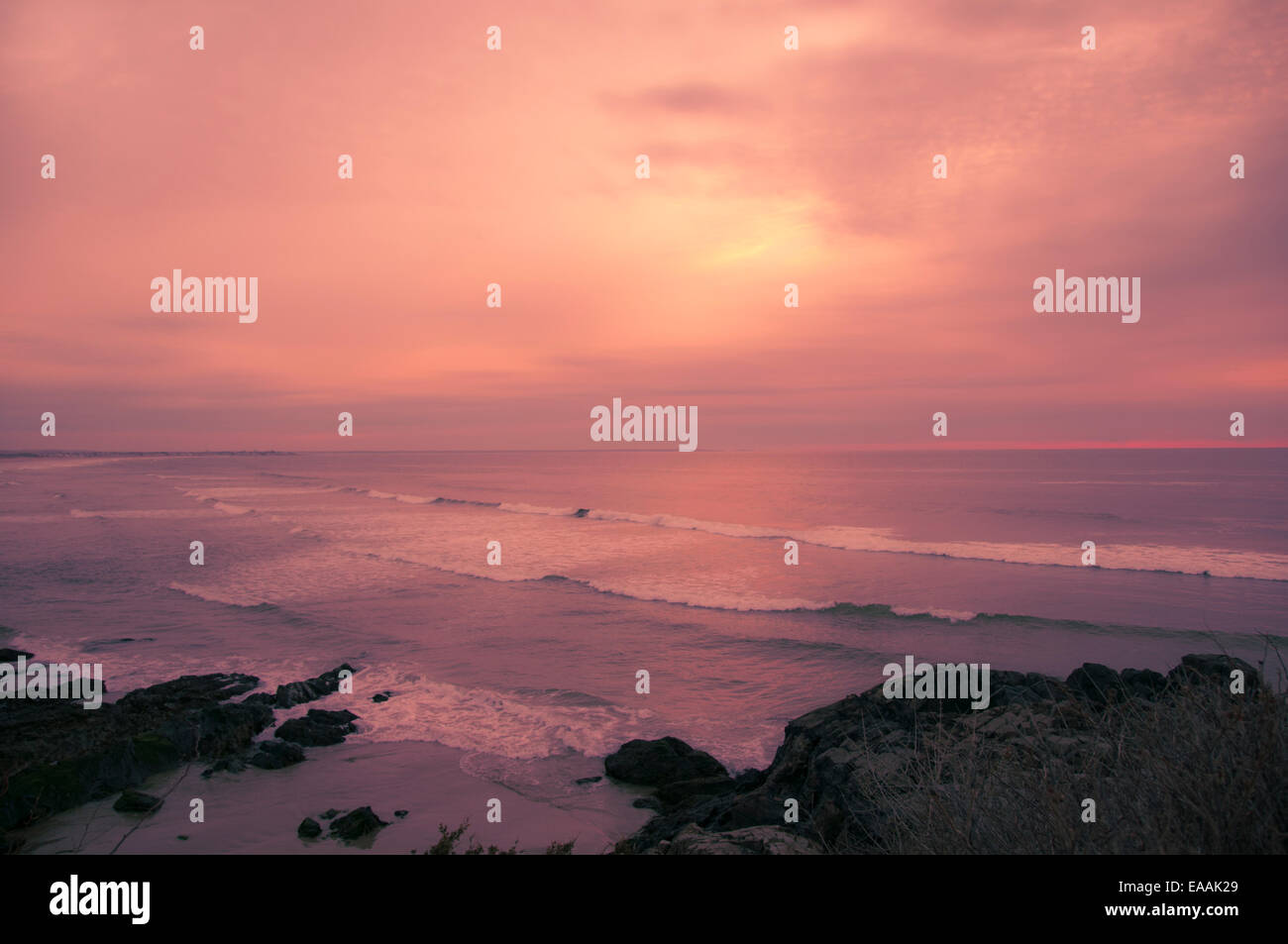 ocean sea seaside rocky beach lighting wave Stock Photo - Alamy