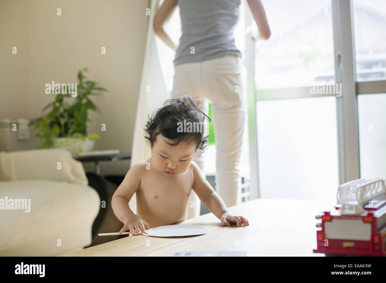 Baby boy rear view hi-res stock photography and images - Alamy