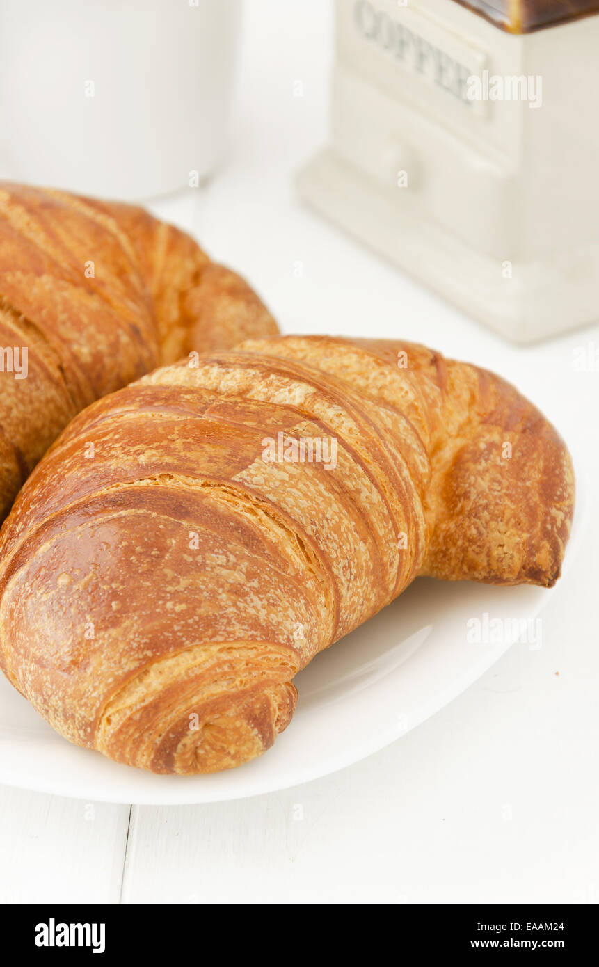 Close up of croissant over white table Stock Photo - Alamy