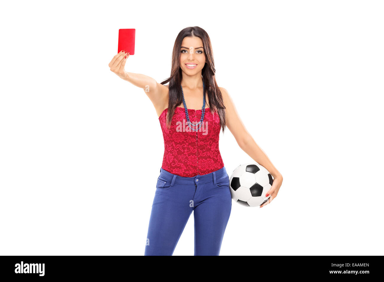 Female football fan showing a red card isolated on white background ...