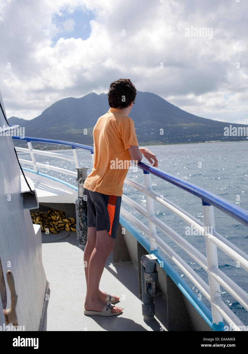 young man on ferry Stock Photo - Alamy
