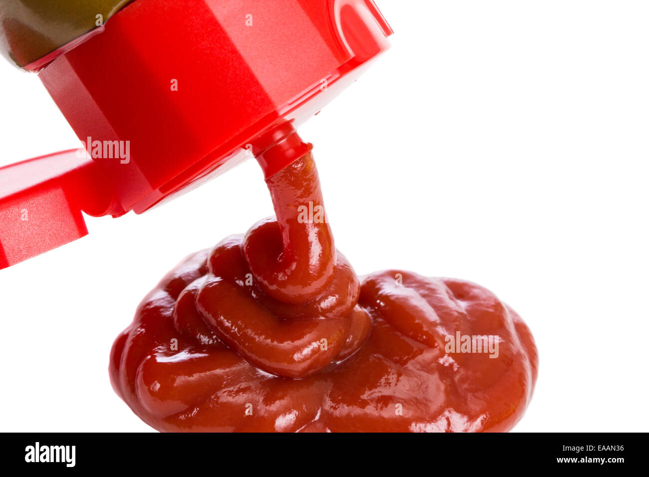 Ketchup pouring out of bottle - isolated over white background Stock ...