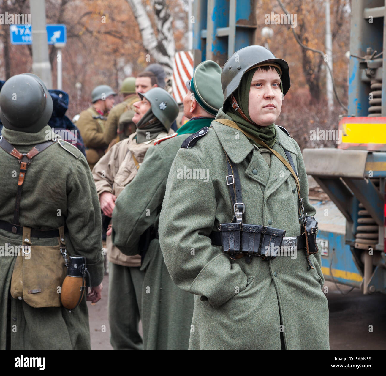 Member of Historical reenactment in German Army uniform after battle ...