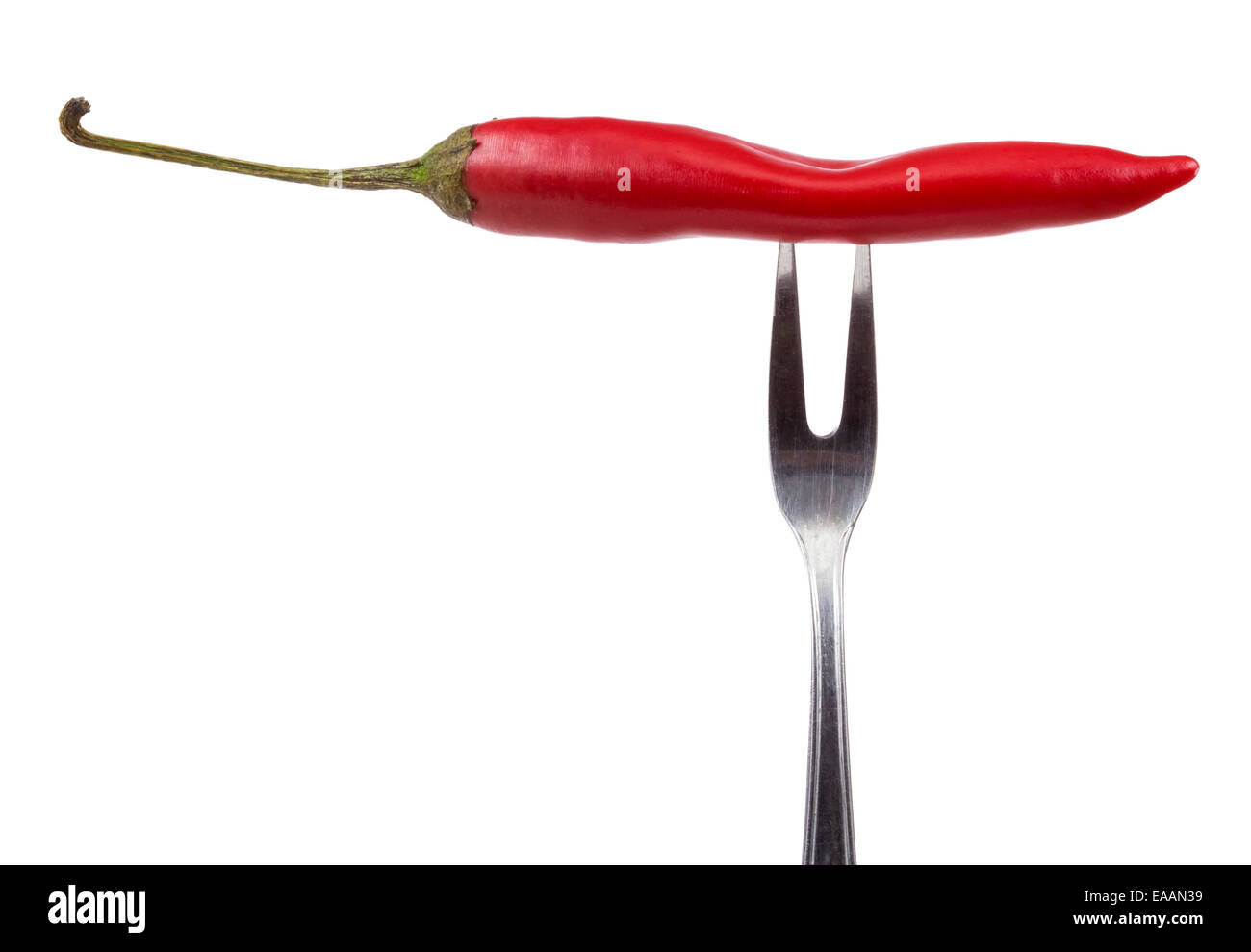Red hot chili peppers on the fork isolated over white background Stock ...
