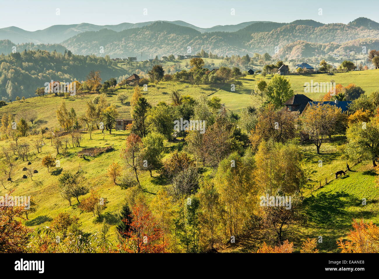 Countryside landscape in a romanian villlage at the food of Piatra ...