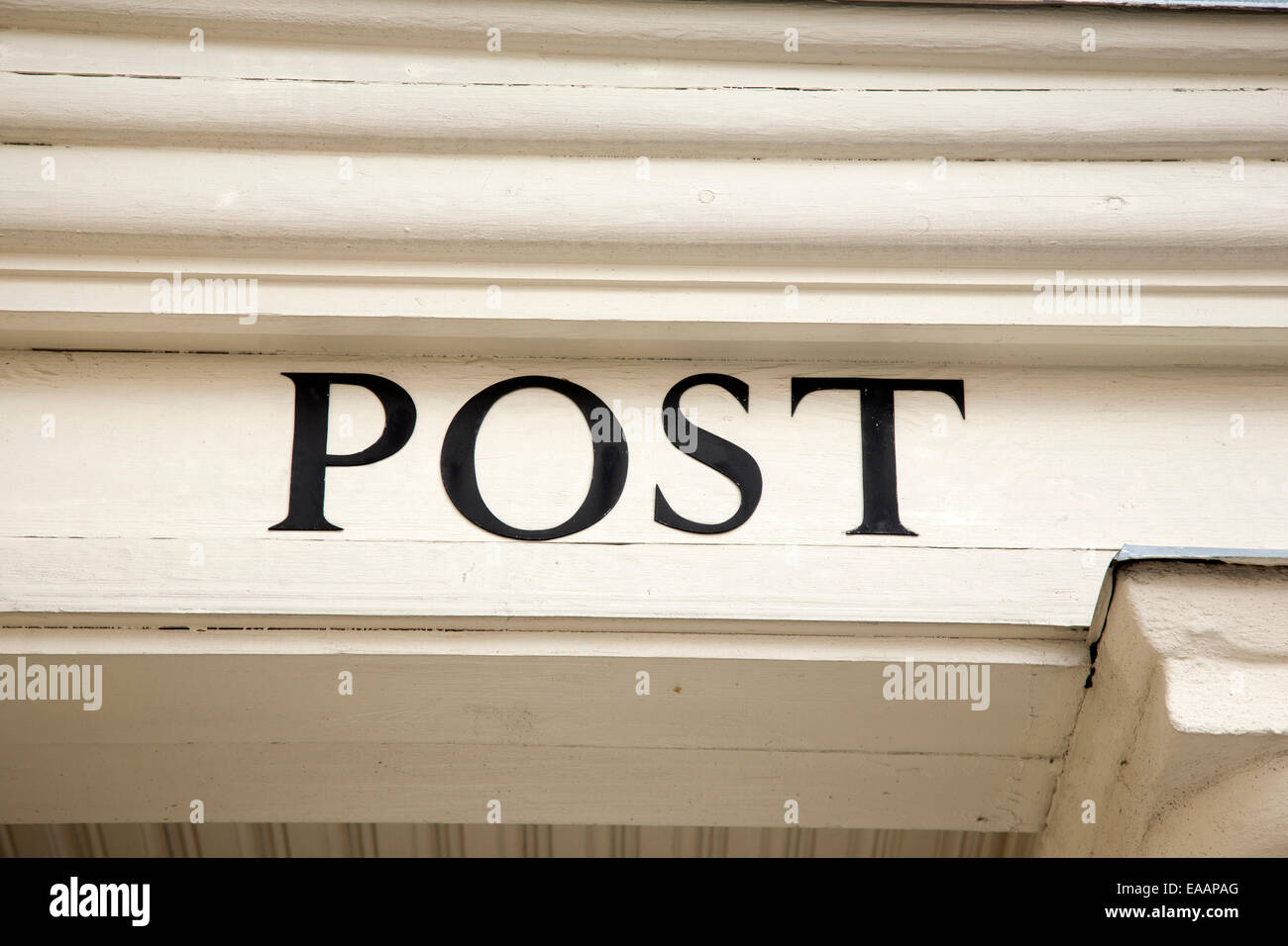 Post Sign on Wooden Wall Stock Photo - Alamy