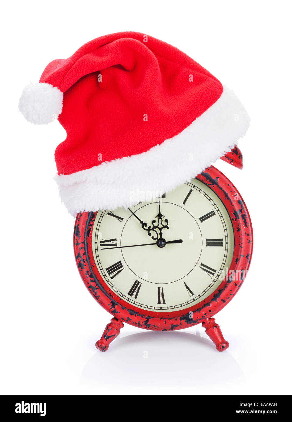 Christmas clock with santa hat. Isolated on white background Stock ...