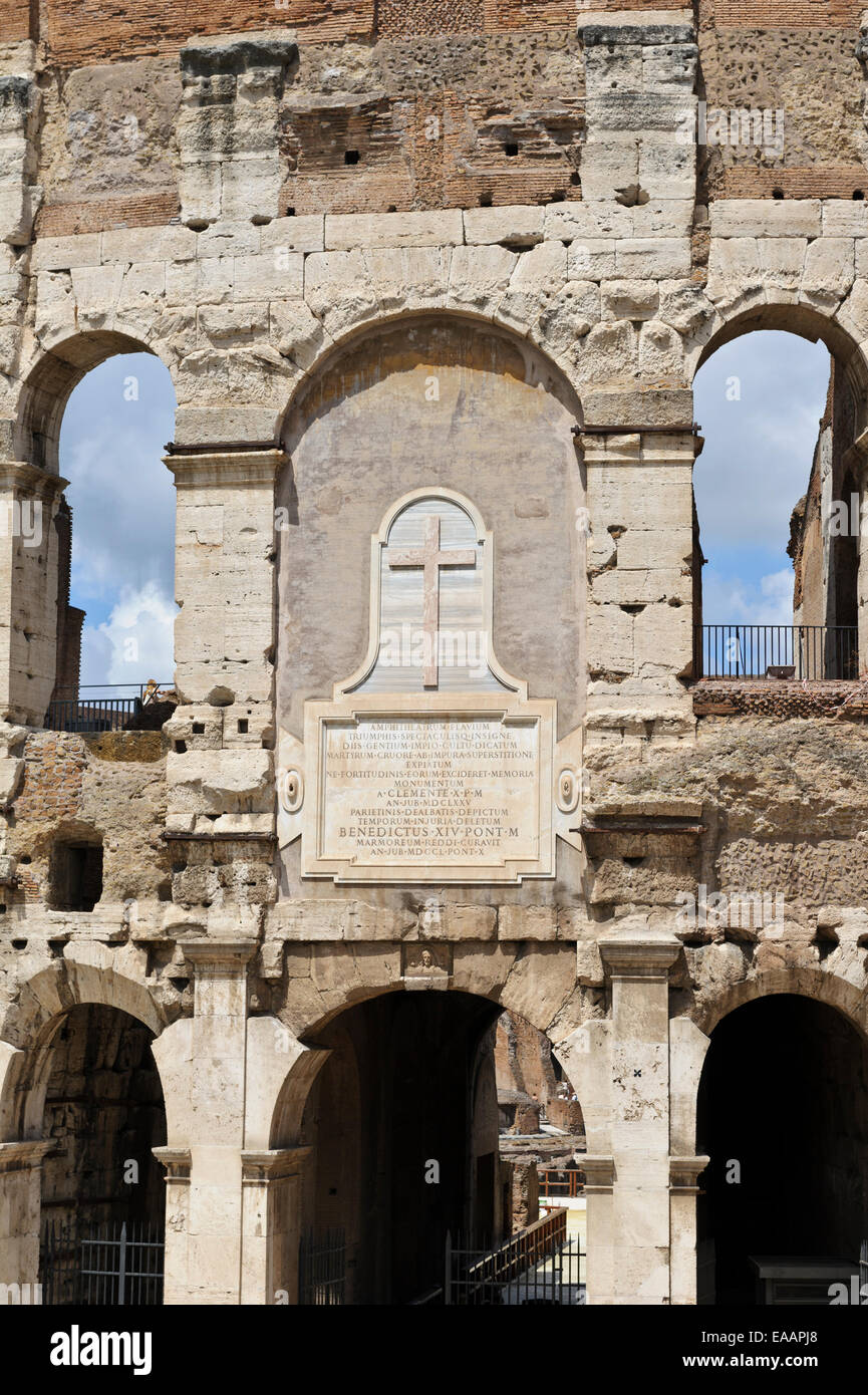 A religious plaque on the exterior wall of the Iconic Colosseum in the ...