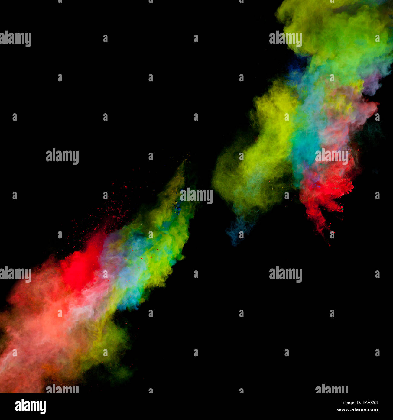 Freeze motion of colored dust explosion isolated on black background ...