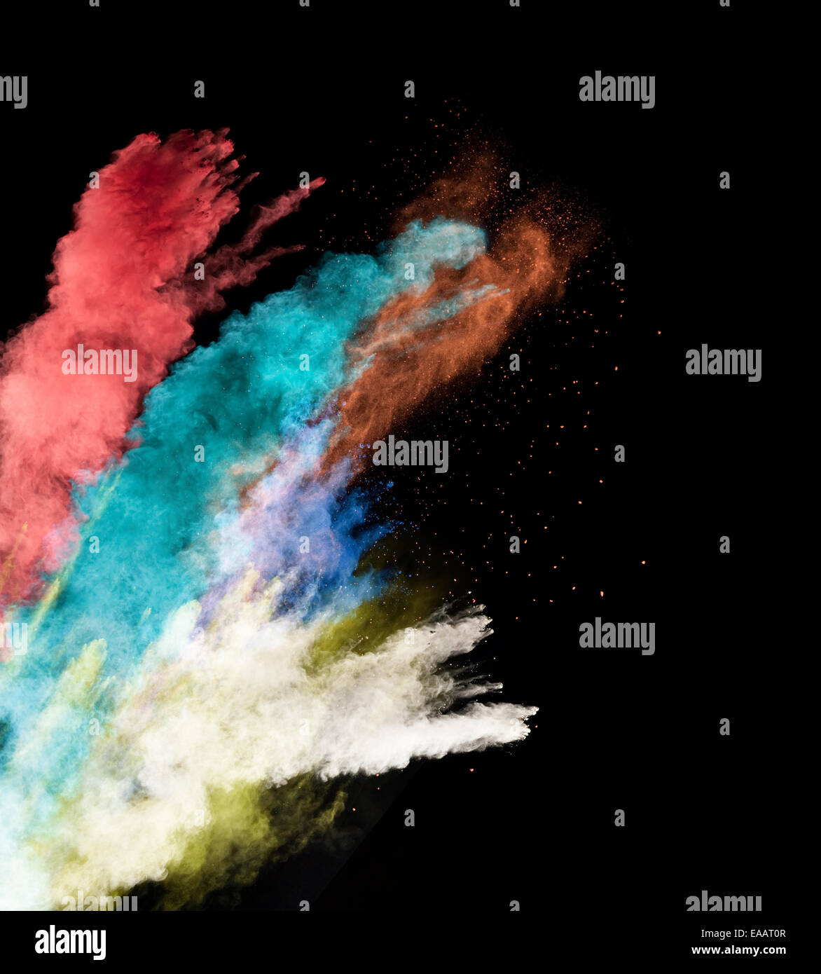 Freeze motion of colored dust explosion isolated on black background ...