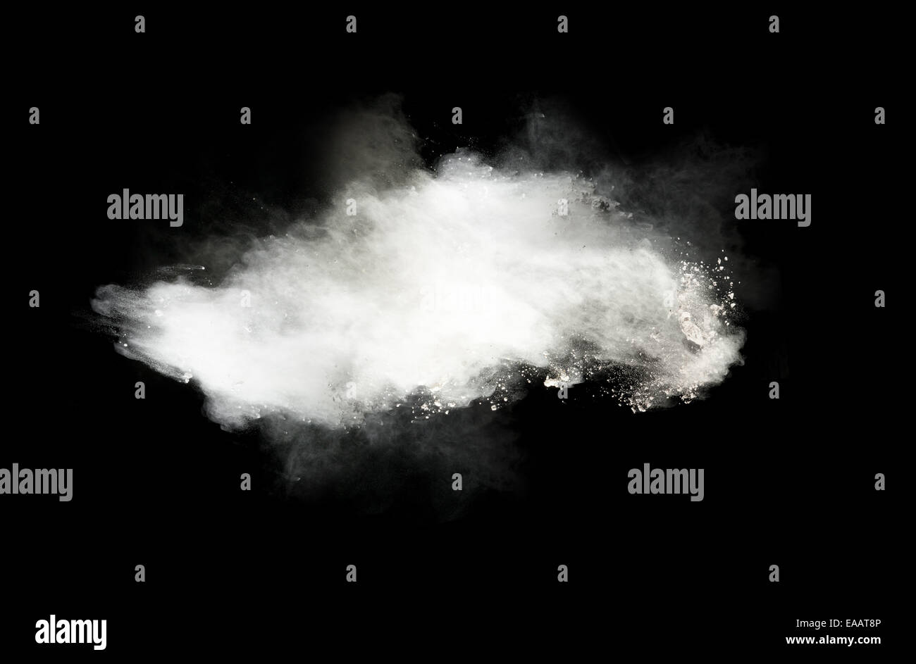 Freeze motion of white dust explosion isolated on black background ...