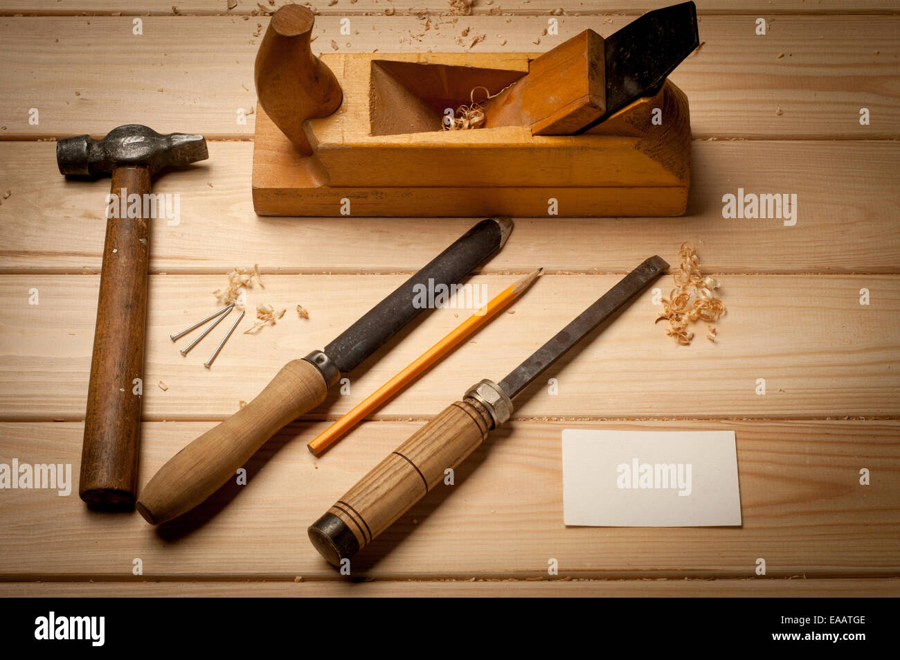 carpenter tools in pine wood table Stock Photo - Alamy