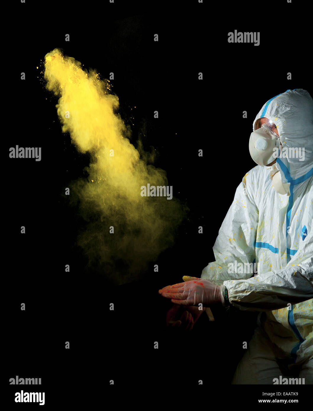 Freeze motion of colored dust explosion throwing by chemist Stock Photo ...