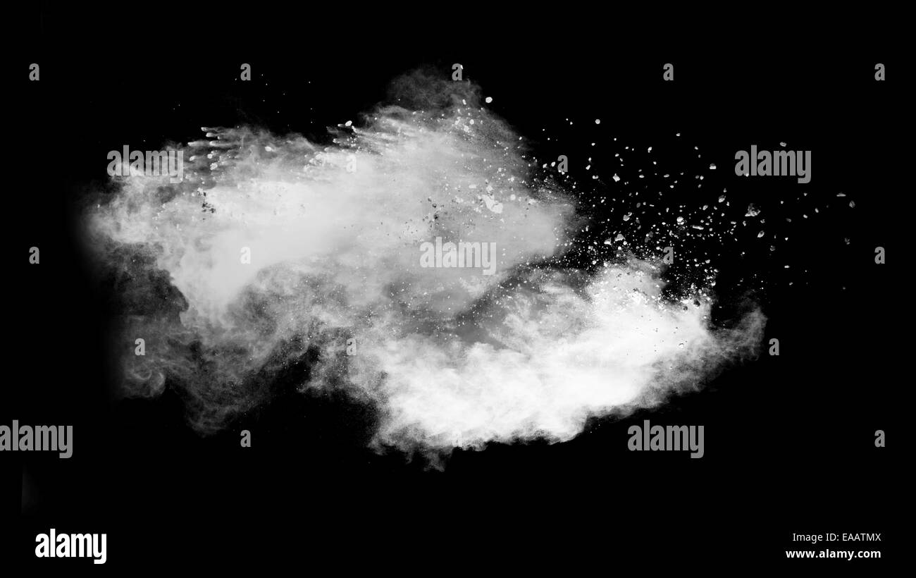 Freeze motion of white dust explosion isolated on black background ...