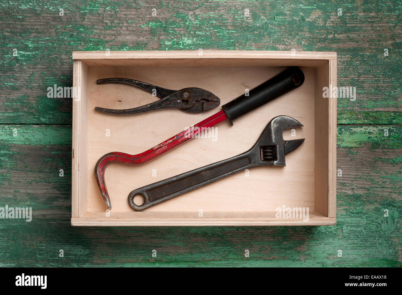 Wooden box with tools close up Stock Photo - Alamy