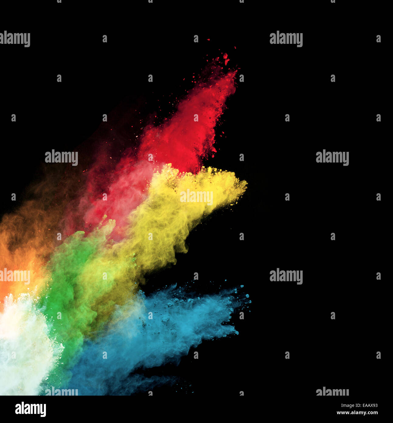Freeze motion of colored dust explosion isolated on black background ...