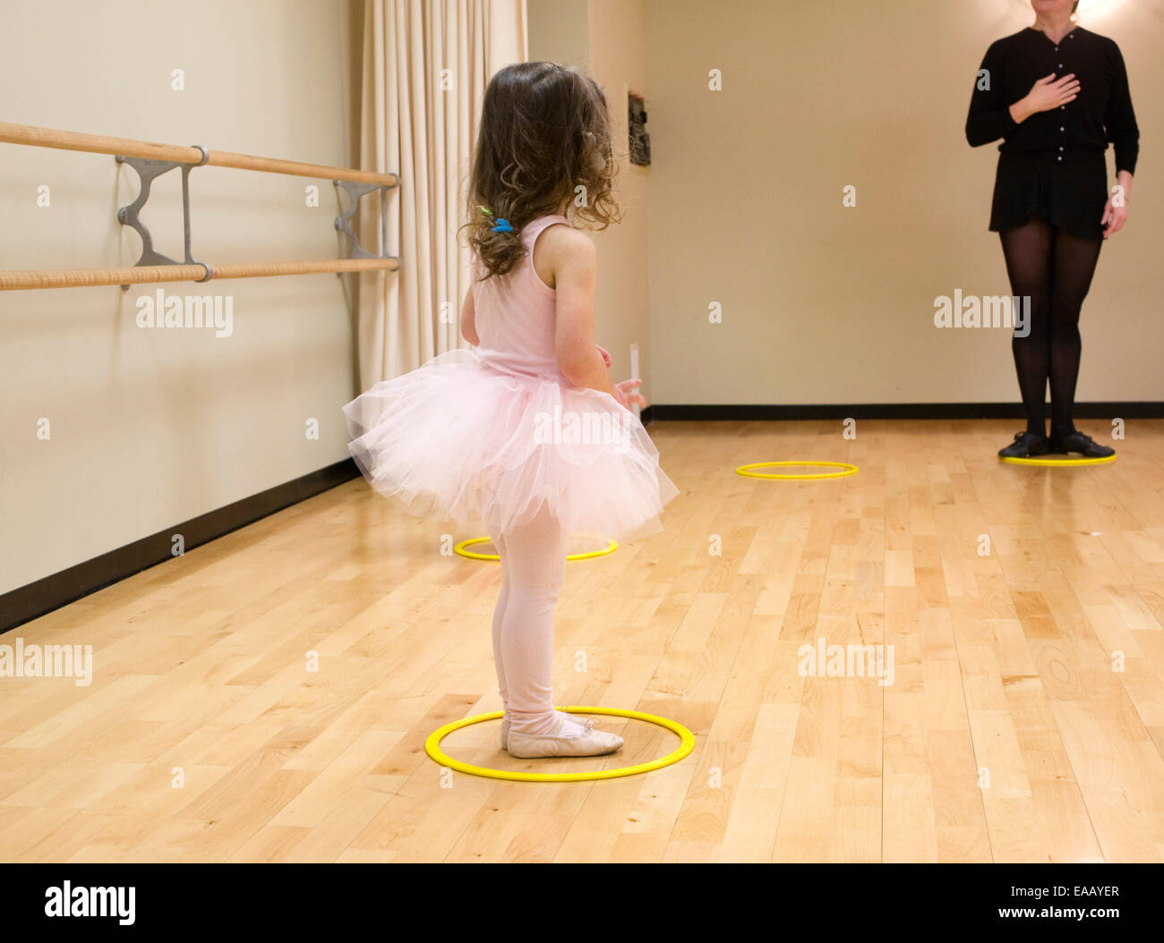 Small girl gets ballet lesson Stock Photo - Alamy
