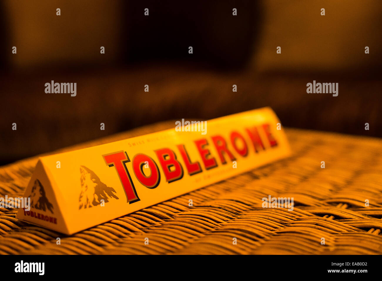 A bar of Toblerone chocolate on a coffee table Stock Photo - Alamy