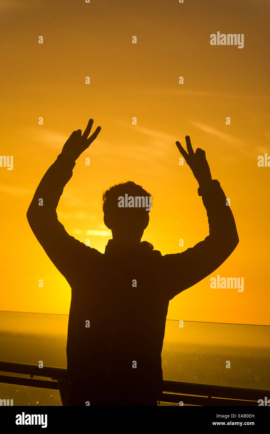 Man giving peace sign hi-res stock photography and images - Alamy