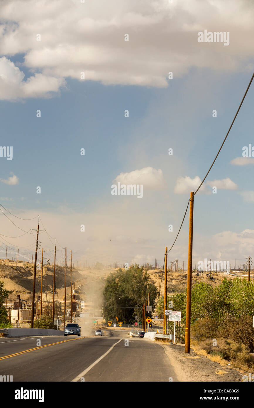 A dust devil blows through the Kern River oilfield in Oildale ...